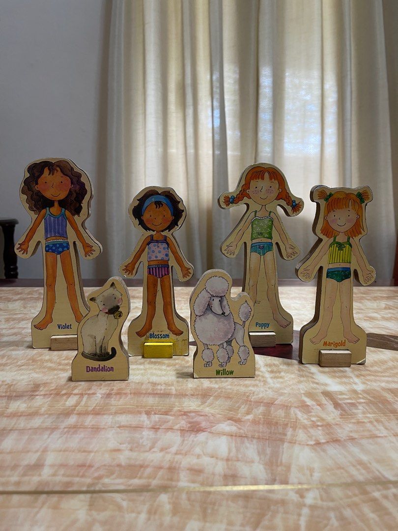 Daisy Girls Wooden Doll House With Magnetic Dress Up on Carousell