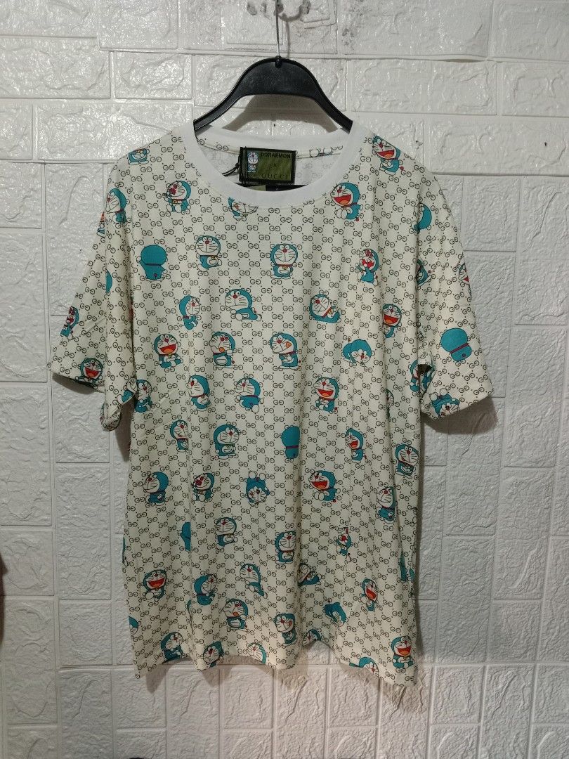 Gucci x doraemon shirt, Luxury, Apparel on Carousell