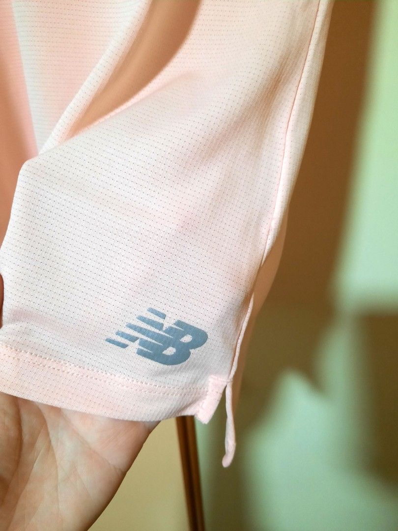 New Balance Peach top, Women's Fashion, Activewear on Carousell