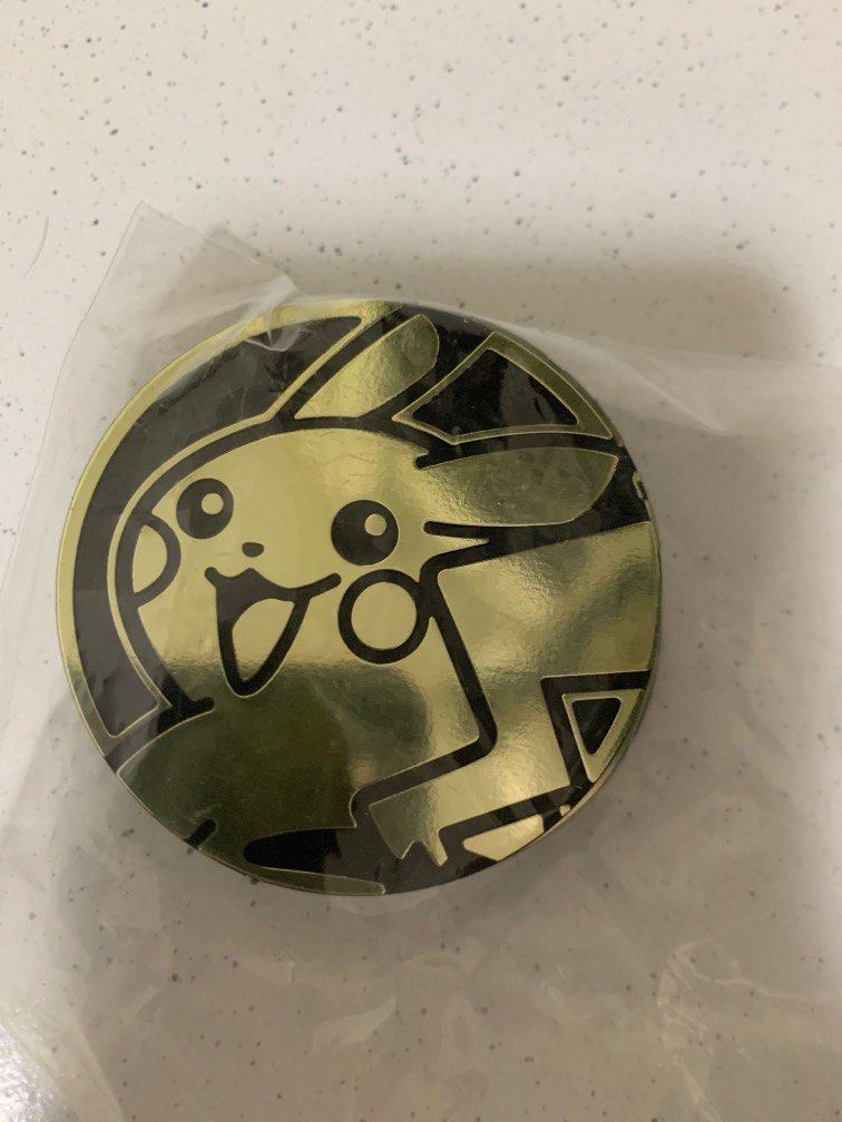 Pokemon tcg pikachu coin, Hobbies & Toys, Toys & Games on Carousell