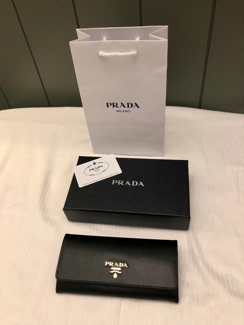 Prada long wallet with receipt, Luxury, Bags & Wallets on Carousell