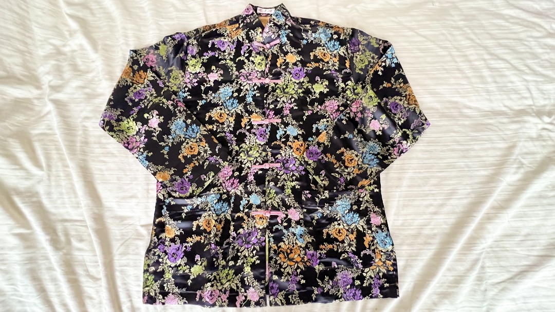black silk like texture colourful pastel tone embroidered floral ...