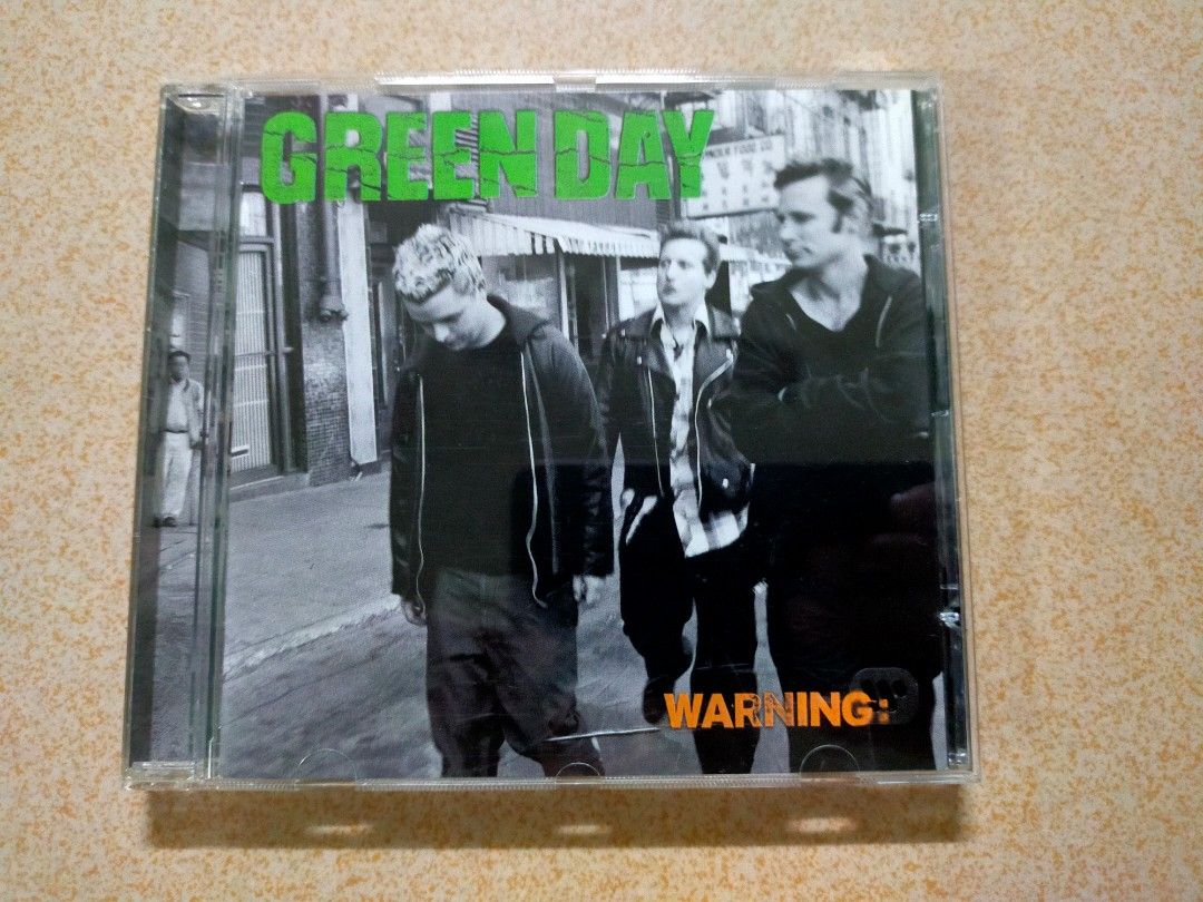 Green Day - Warning, Hobbies & Toys, Music & Media, CDs & DVDs on Carousell