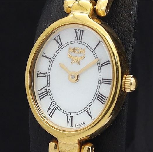 MCM Roman oval Mother of Pearl dial, Women's Fashion, Watches ...