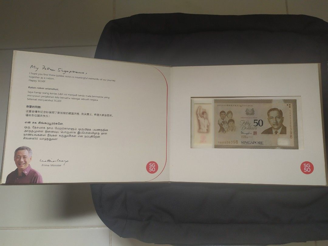 SG50 Commemorative Notes set with folder (1 x $50 + 5 x $10) issue date ...