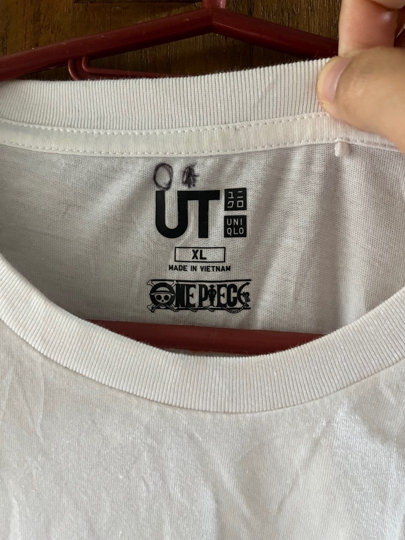 Thrift One piece Uniqlo XL, Men's Fashion, Tops & Sets, Tshirts & Polo Shirts on Carousell
