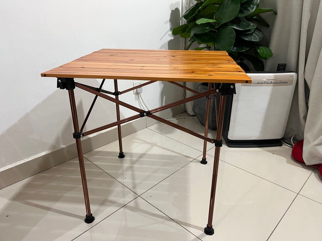 Coleman egg roll table, Sports Equipment, Hiking & Camping on Carousell