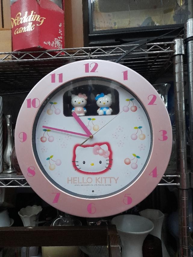 Hello kitty clock, Furniture & Home Living, Home Decor, Clocks on Carousell