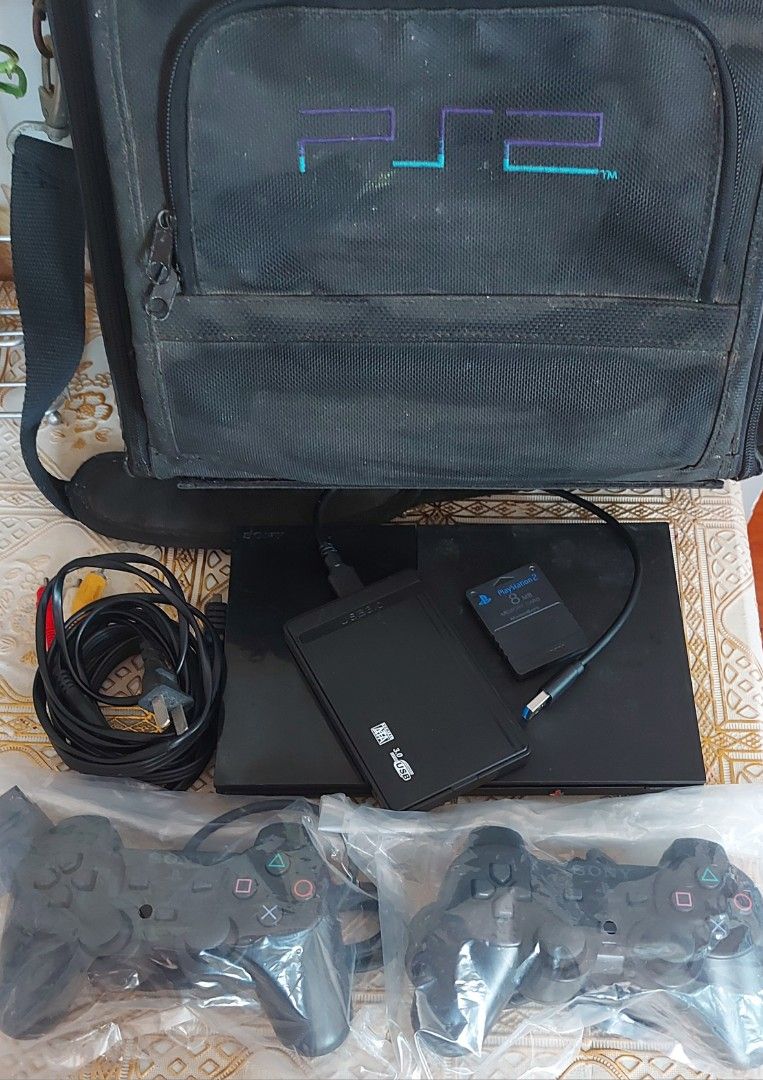 PS2 Complete Set with 100 games and free PS2 Bag, Video Gaming, Video ...