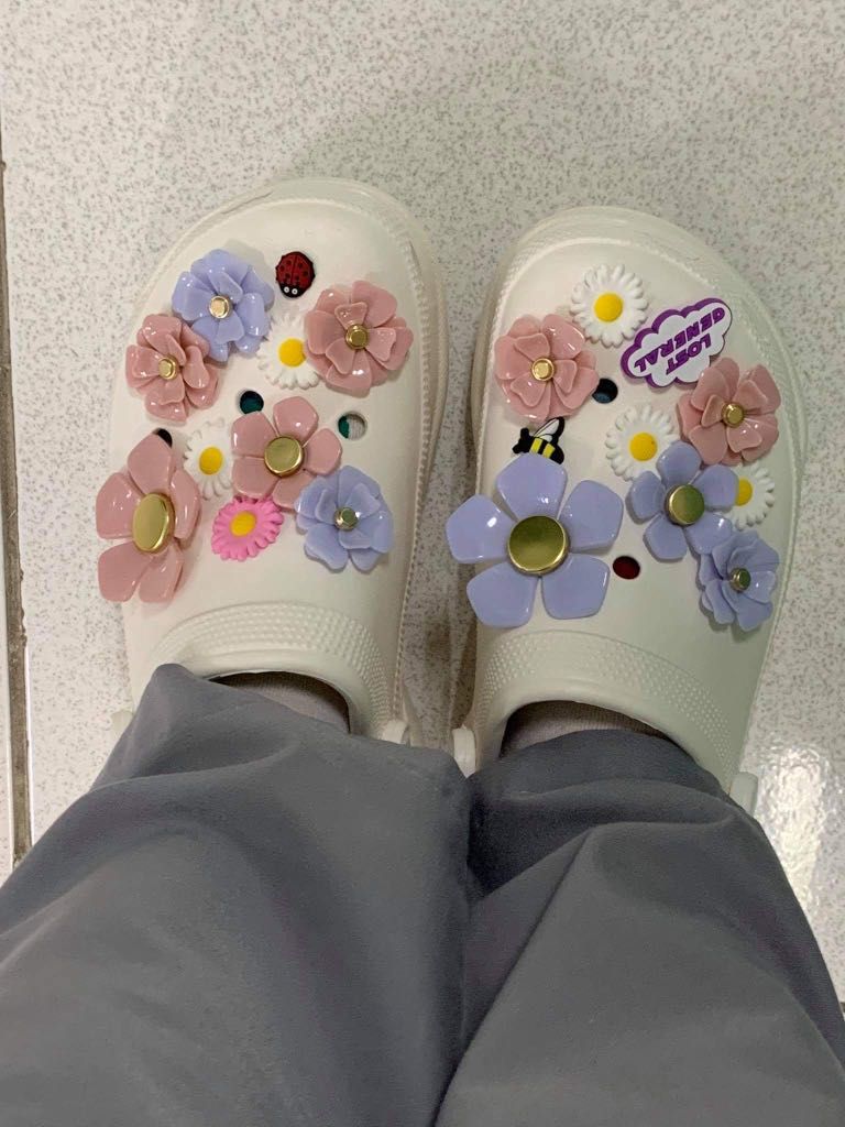 Crocs floral platform clogs with Jibbitz included on Carousell