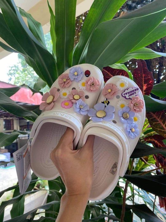 Crocs floral platform clogs with Jibbitz included on Carousell