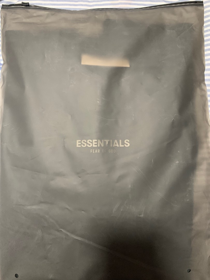 Fear of god essentials s22, Men's Fashion, Tops & Sets, Tshirts & Polo ...