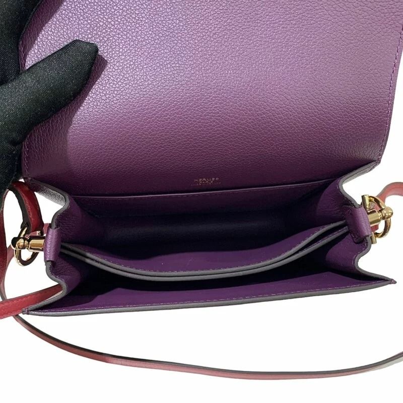 全新HERMES MINI ROULIS 黑加侖紫色拼石榴紅淡金扣Evercolor皮 #BRAND NEW #香榭站正品 on Carousell
