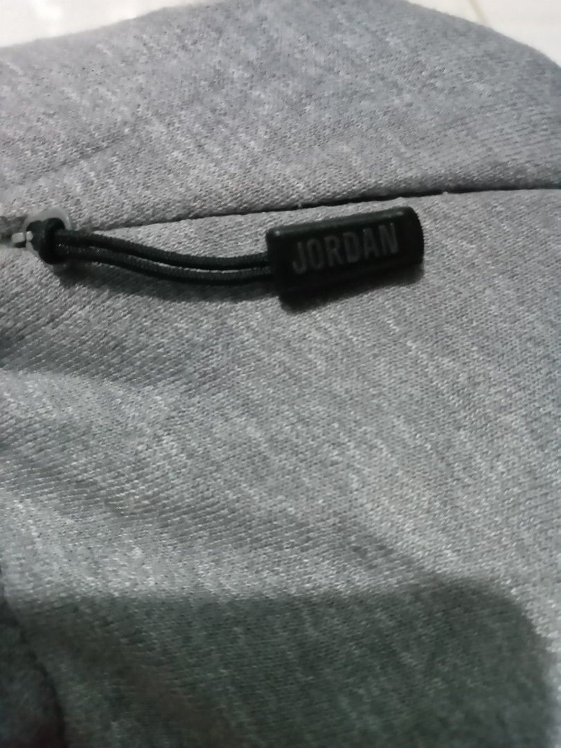 Nike Air jordan tech fleece, Men's Fashion, Bottoms, Joggers on Carousell