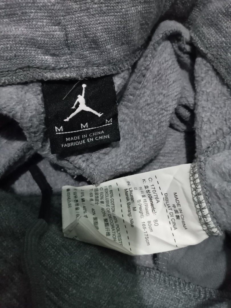 Nike Air jordan tech fleece, Men's Fashion, Bottoms, Joggers on Carousell
