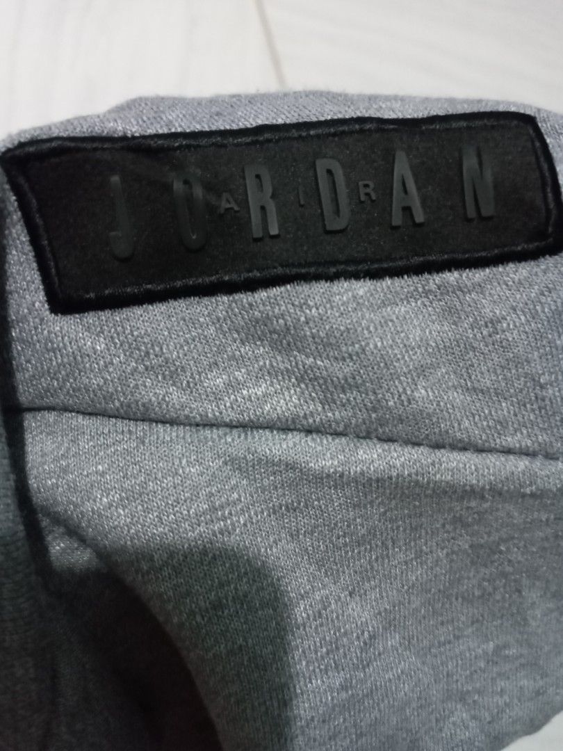 Nike Air jordan tech fleece, Men's Fashion, Bottoms, Joggers on Carousell