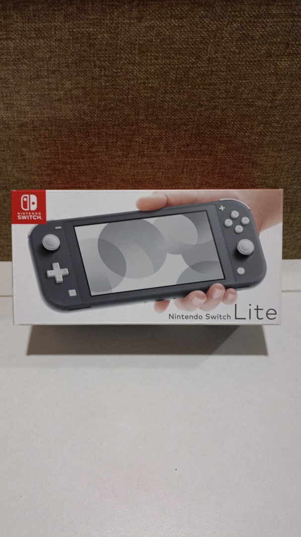 Nintendo Switch Lite full set in great conditions. Original box and ...