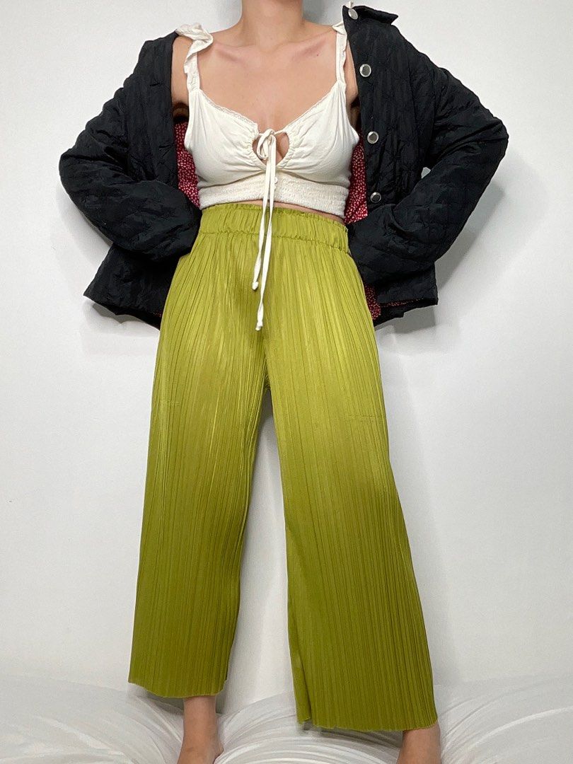 Puke green pleated pants and black quilted bomber jacket, Women's ...