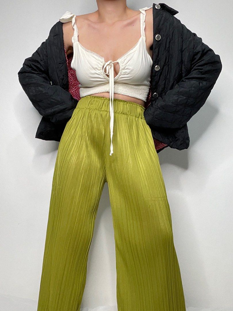 Puke green pleated pants and black quilted bomber jacket, Women's ...