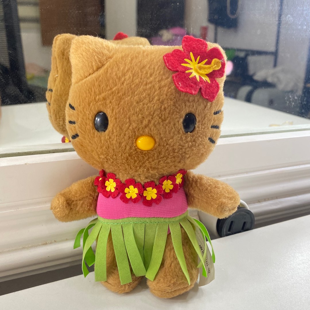 Auth Hello Kitty Tan Hawaiian on Carousell
