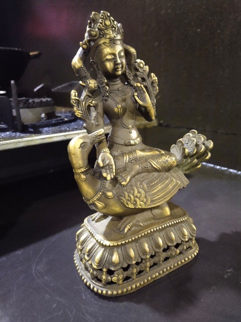 Brass sino tibetan goddess Tara riding hamsa statue on Carousell