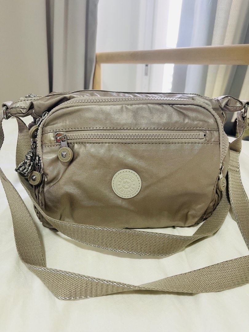Authentic Kipling Sling Bag, Men's Fashion, Bags, Sling Bags on Carousell