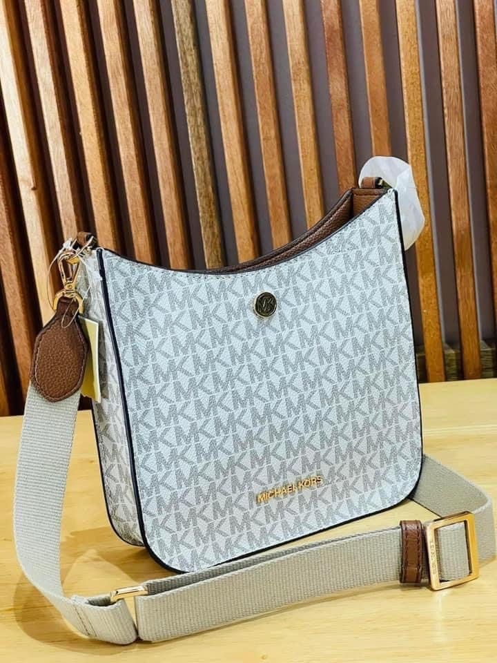 MK Briley Small Logo Messenger Bag, Luxury, Bags & Wallets on Carousell