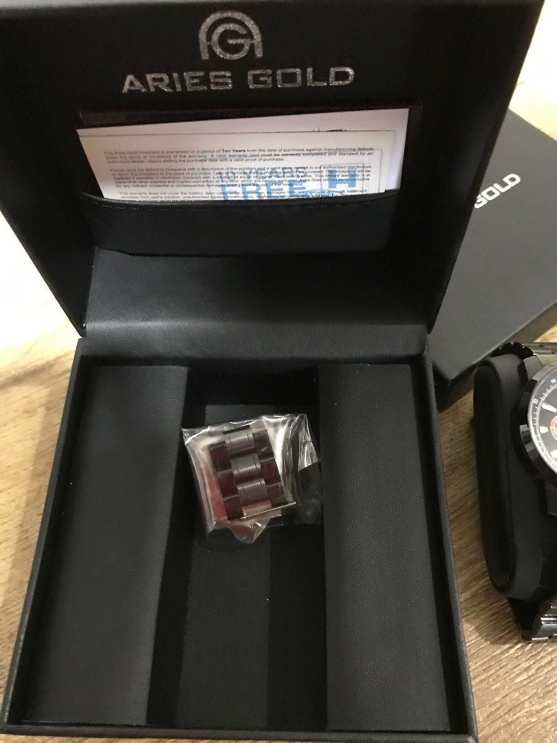 Aries Gold black watch, Luxury, Watches on Carousell