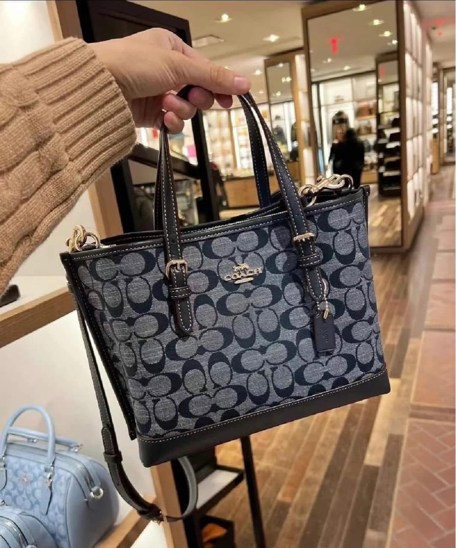 Coach hand/slingbag on Carousell