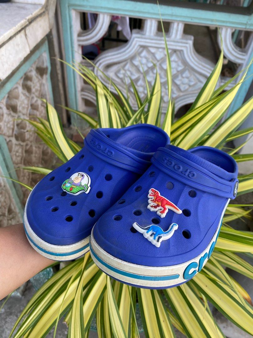 Crocs with jibbits on Carousell