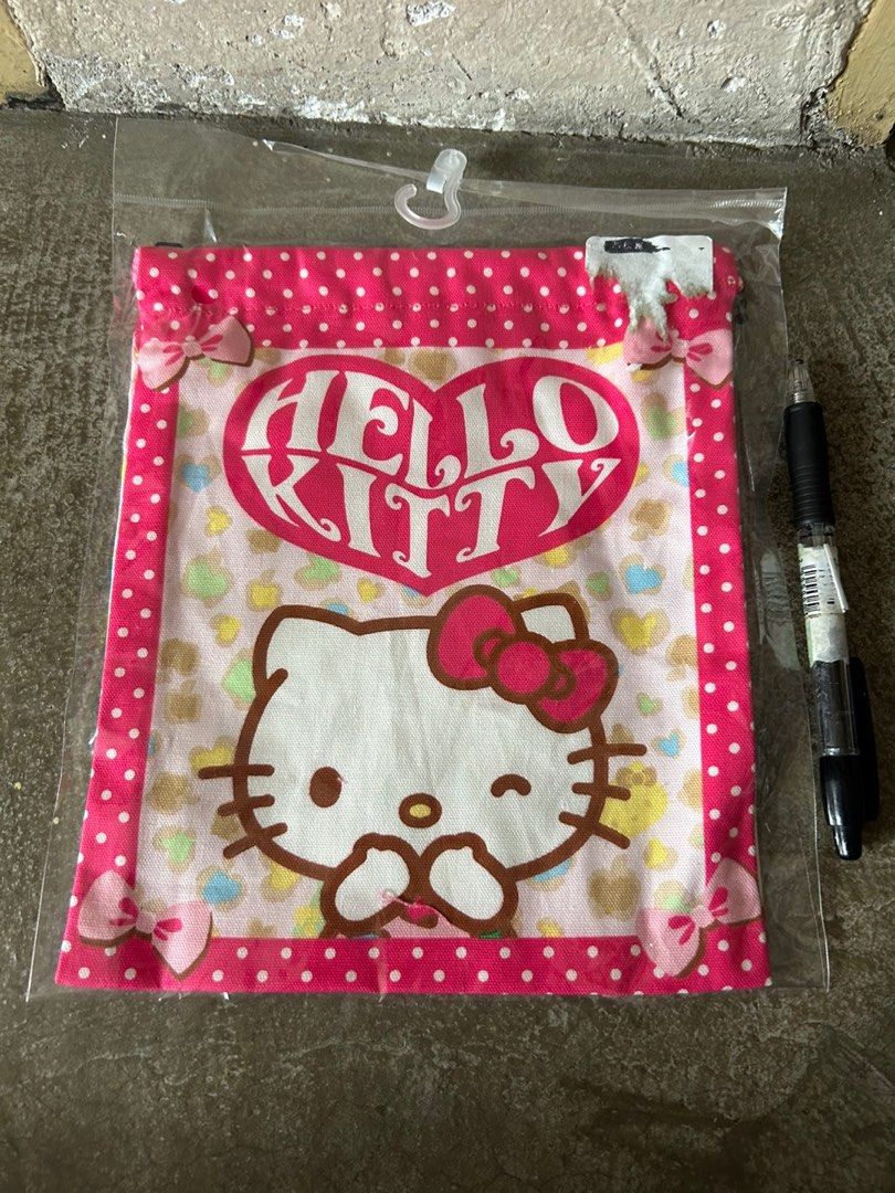 Hello kitty small pouch, Hobbies & Toys, Toys & Games on Carousell