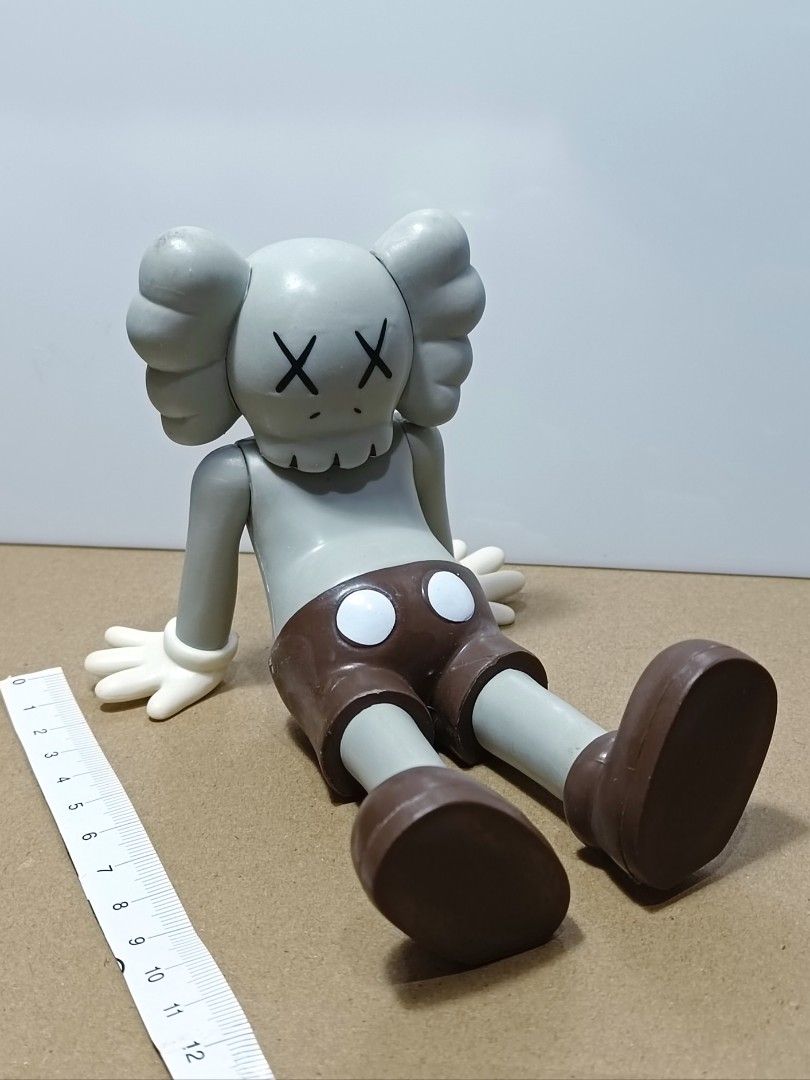 Kaws collector vinyl figure, Hobbies & Toys, Toys & Games on Carousell