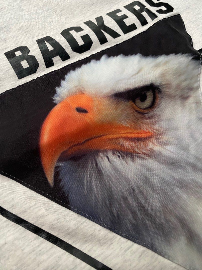 DE BACKERS | classic fit white graphic tee on Carousell