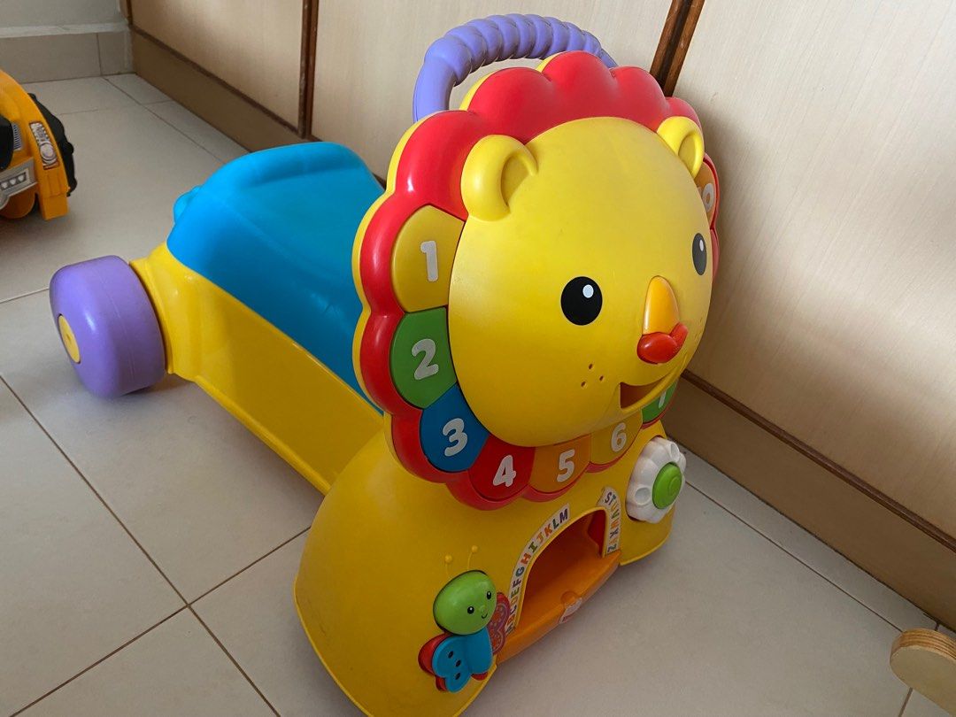 Fisher Price Ride-On Lion, Hobbies & Toys, Toys & Games on Carousell