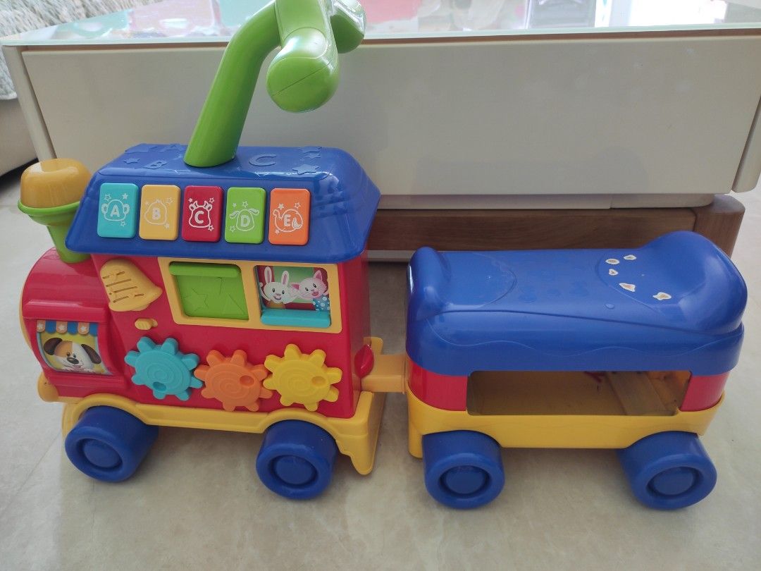 Walker ride on learning train, Babies & Kids, Infant Playtime on Carousell