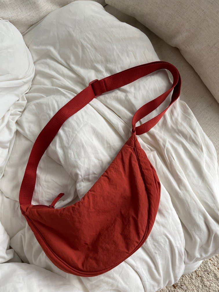 Uniqlo dumpling bag, Women's Fashion, Bags & Wallets, Shoulder Bags on ...