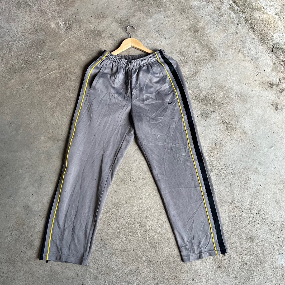 Nike Seluar Track / Deck, Men's Fashion, Bottoms, Joggers on Carousell