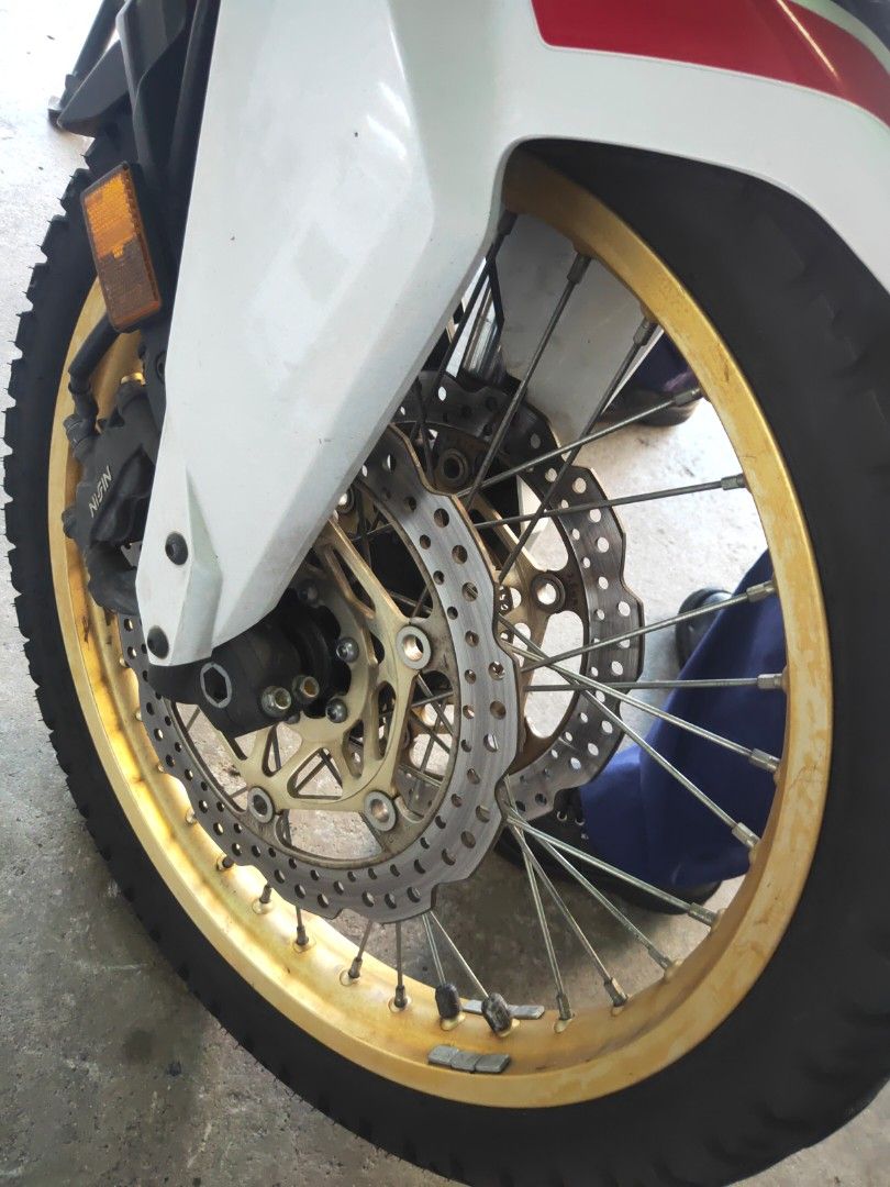 Stock Africa Twin crf1000L gold rims with Shinko E705 tyres with 70% ...