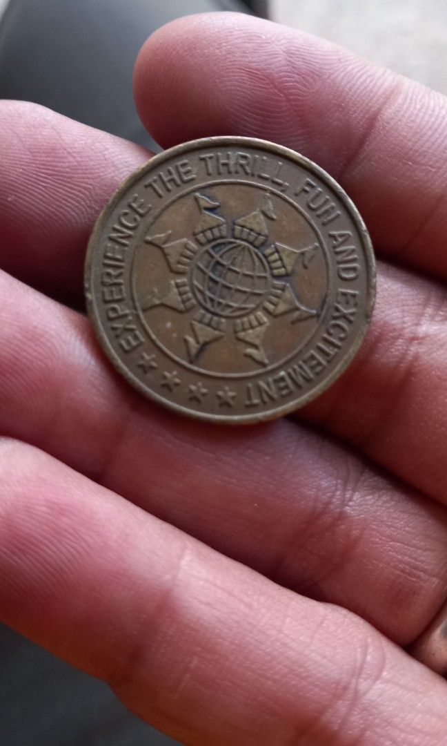 Vintage world of fun token on Carousell