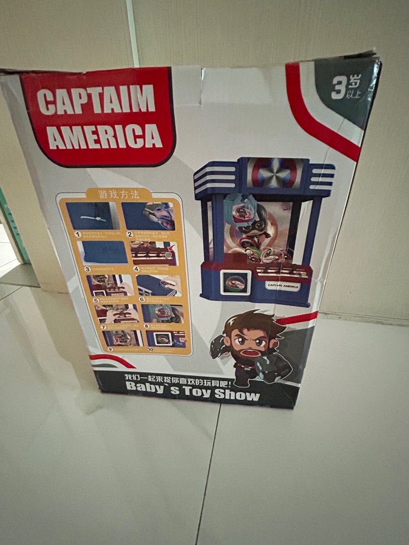 Catch doll machine, Hobbies & Toys, Toys & Games on Carousell