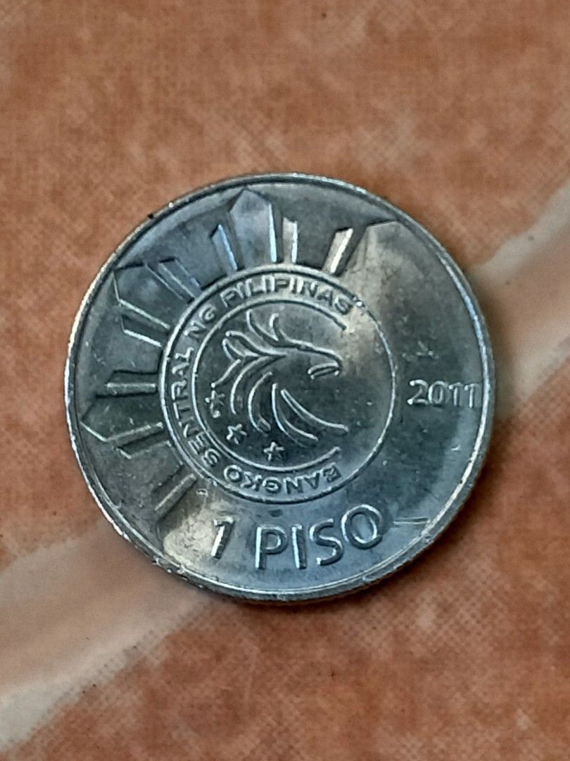 Commemorative 1 piso coin sold per pc on Carousell