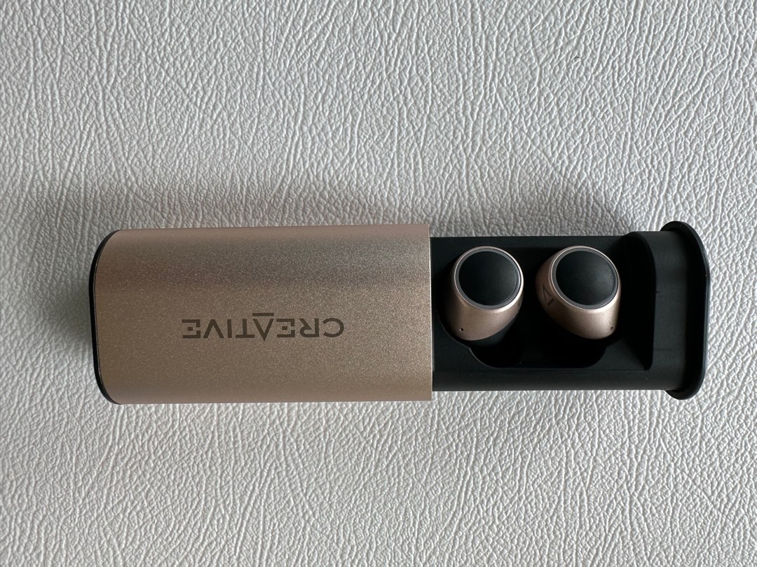 Creative outlier earphone (gold) cheap, Audio, Earphones on Carousell