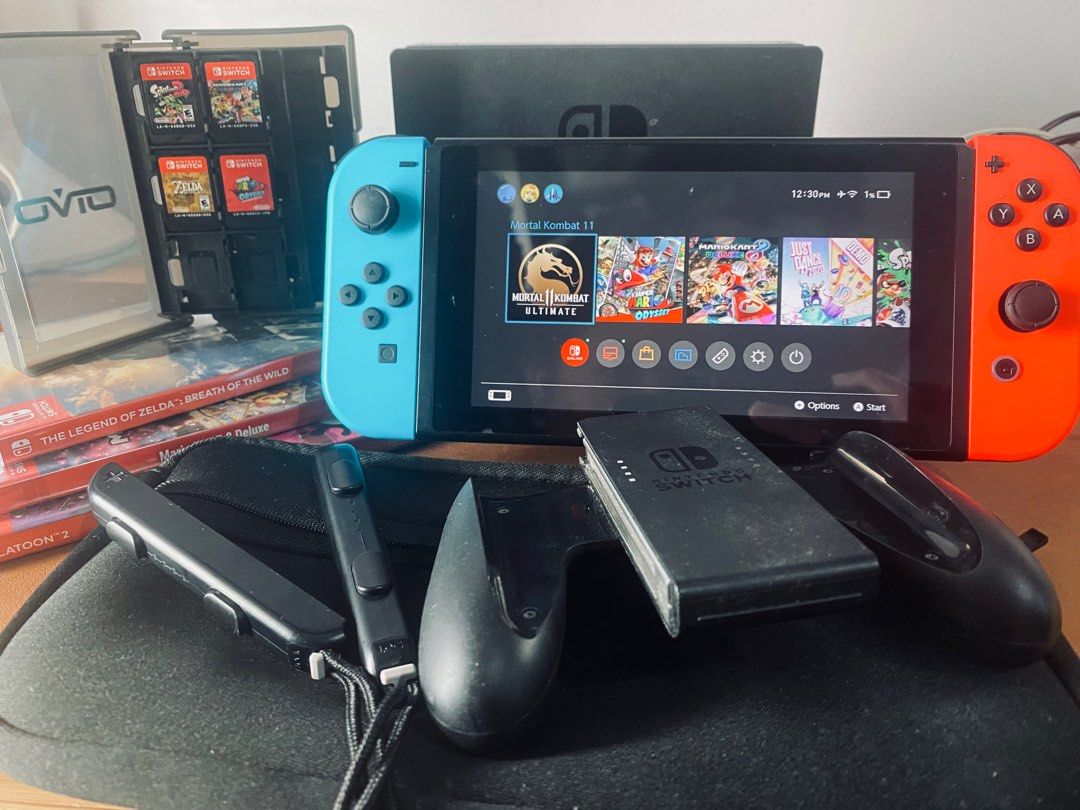 Nintendo switch version 2 Console + 64gb sd card +mortal kombat 11 ...