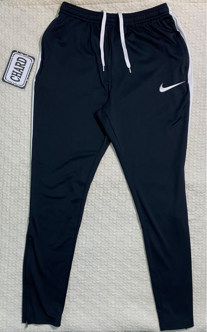 NIKE Track Pants Ankle zip‼️, Men's Fashion, Bottoms, Jeans on Carousell