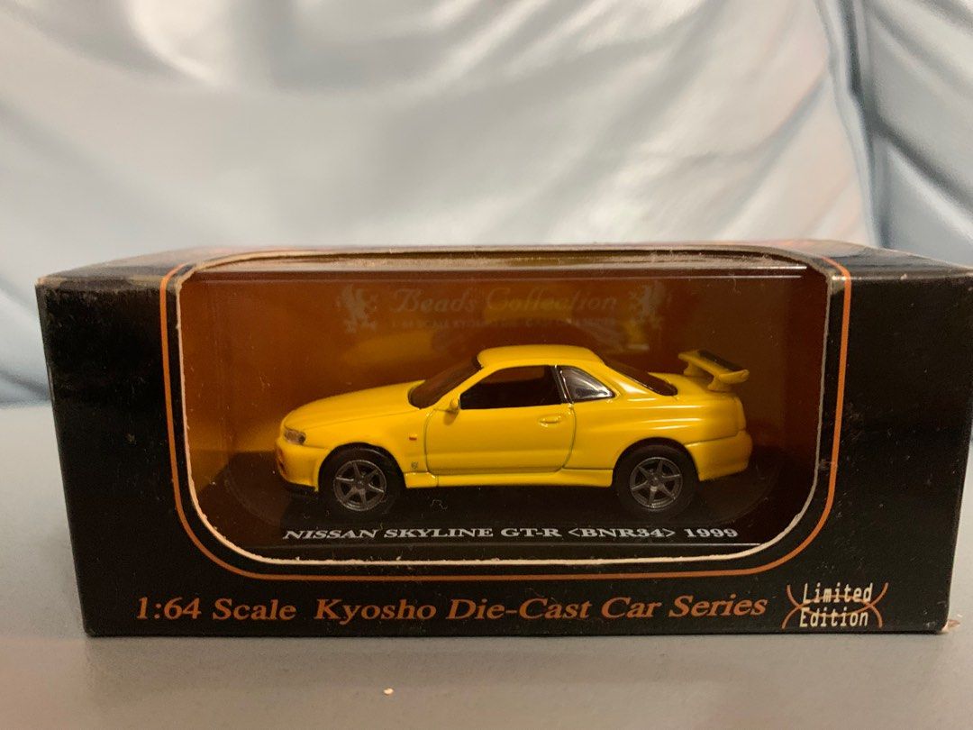1:64 Kyosho Nissan Skyline R34 GTR - Yellow, 興趣及遊戲, 玩具 & 遊戲類 - Carousell