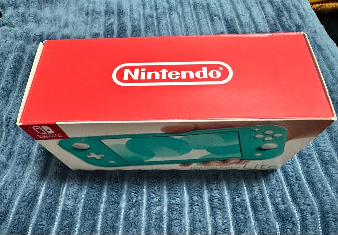 BNIB Turquoise Nintendo Switch Lite, Video Gaming, Video Game Consoles, Nintendo on Carousell