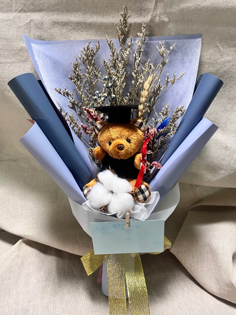 Graduation bear bouquet with cotton flower, Hobbies & Toys, Stationery ...