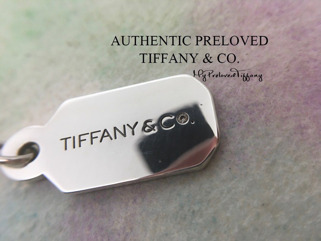 Authentic Tiffany & Co. Logo Tag Diamond Silver Charm, Women's Fashion ...