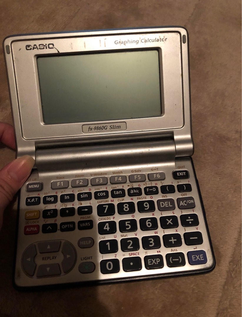 Casio slim fx 9860g graphing calculator, Computers & Tech, Office ...