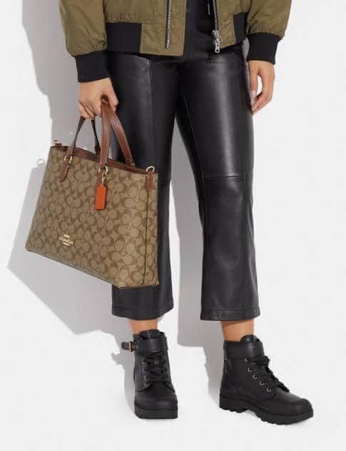 Coach Signature Tyler Cross Body on Carousell